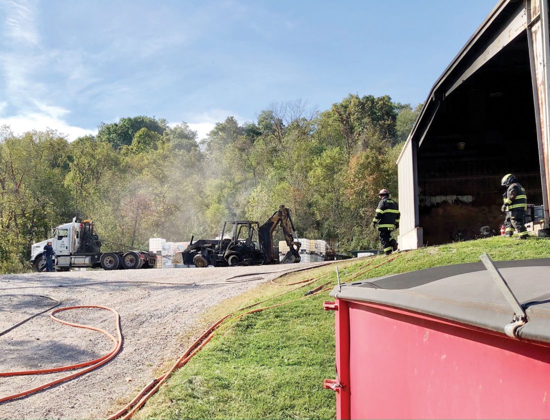 Backhoe catches fire in Belpre | News, Sports, Jobs - News and Sentinel